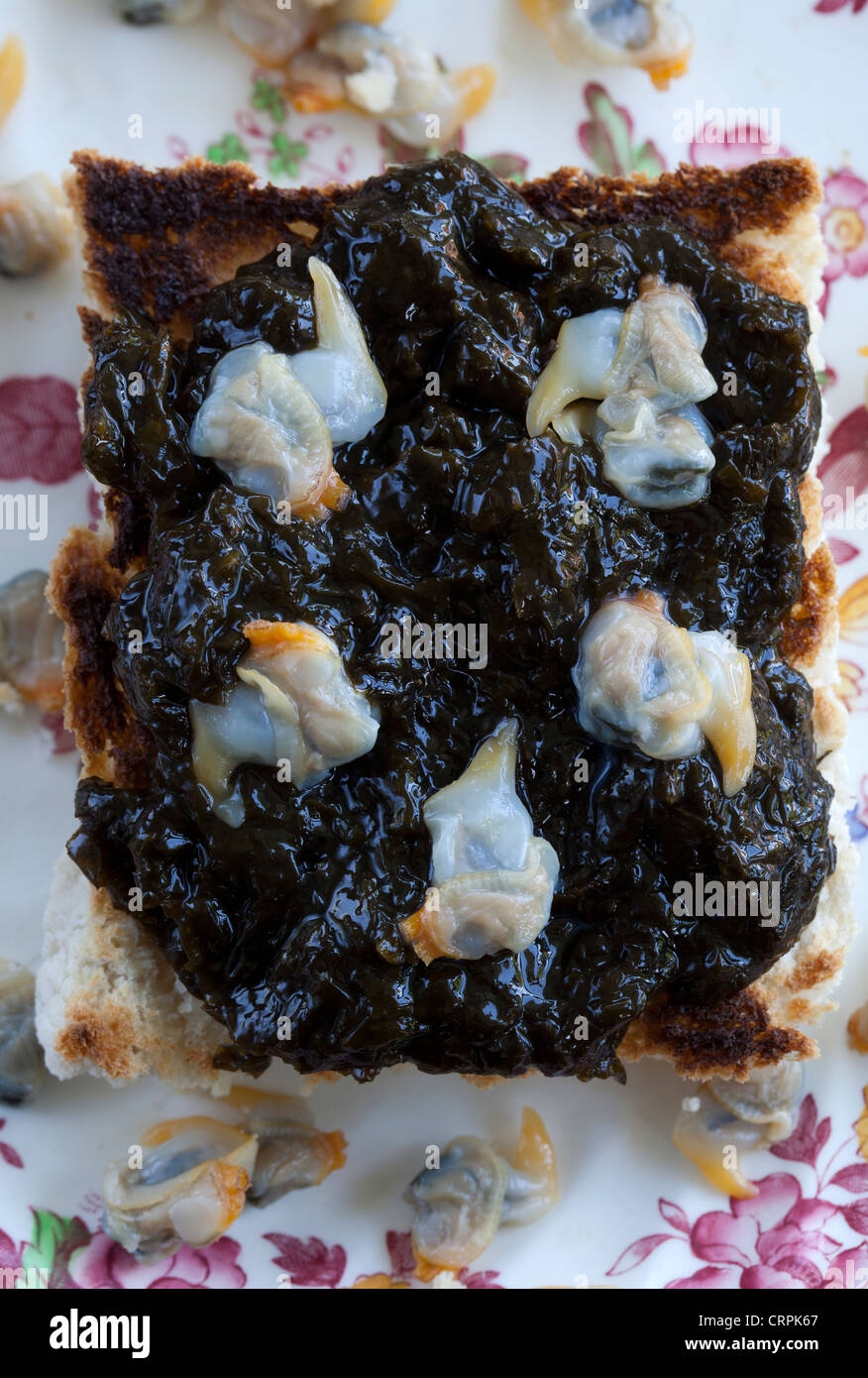 Laver Bread with Cockles on Toast - a Welsh Breakfast Delicacy Stock ...