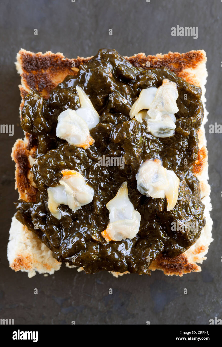 Cockels and Laver Bread Seaweed on Toast Stock Photo - Alamy