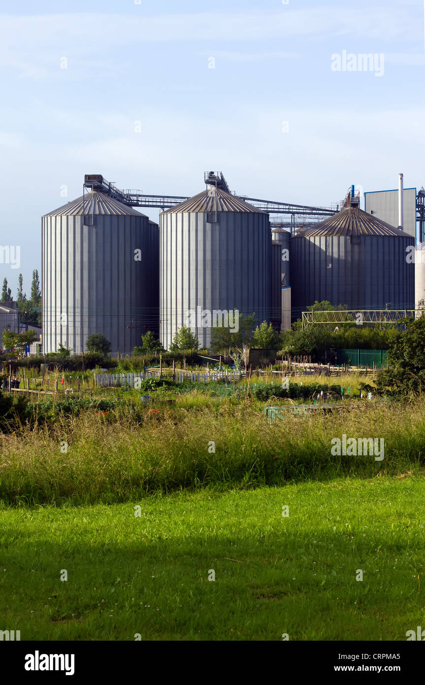 three large cylinder shaped buildings Stock Photo - Alamy