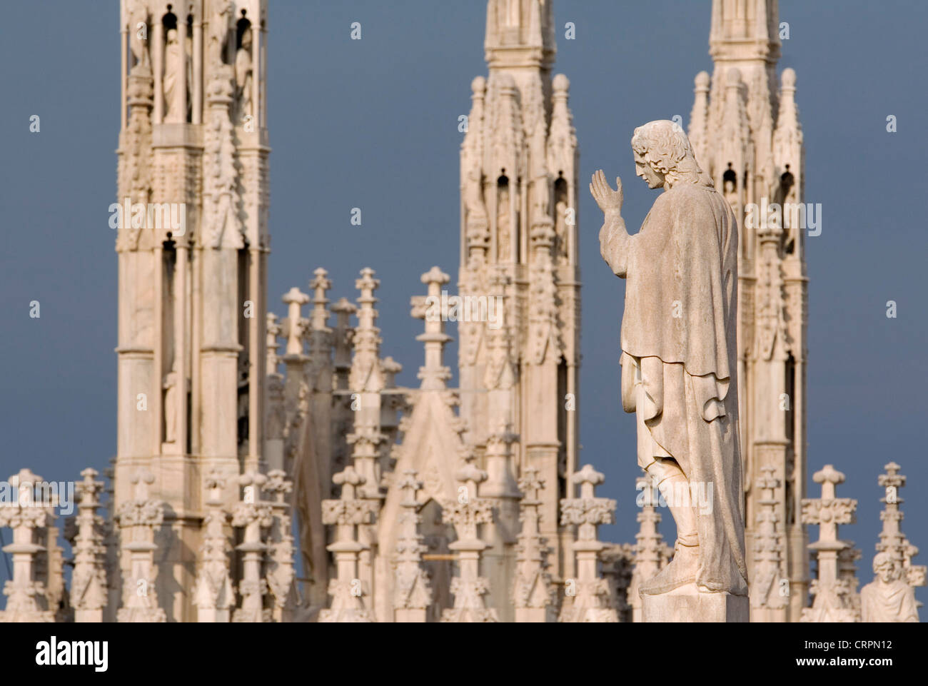 Spires and statues on the Duomo (Milan Cathedral) rooftop, Milan ...