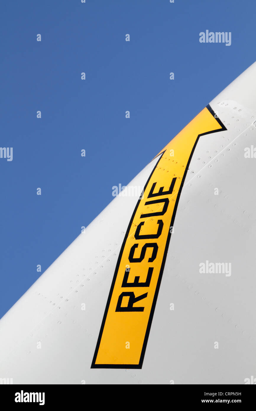 Looking to heaven for a rescue. A sign pointing to the rescue hatch on ...