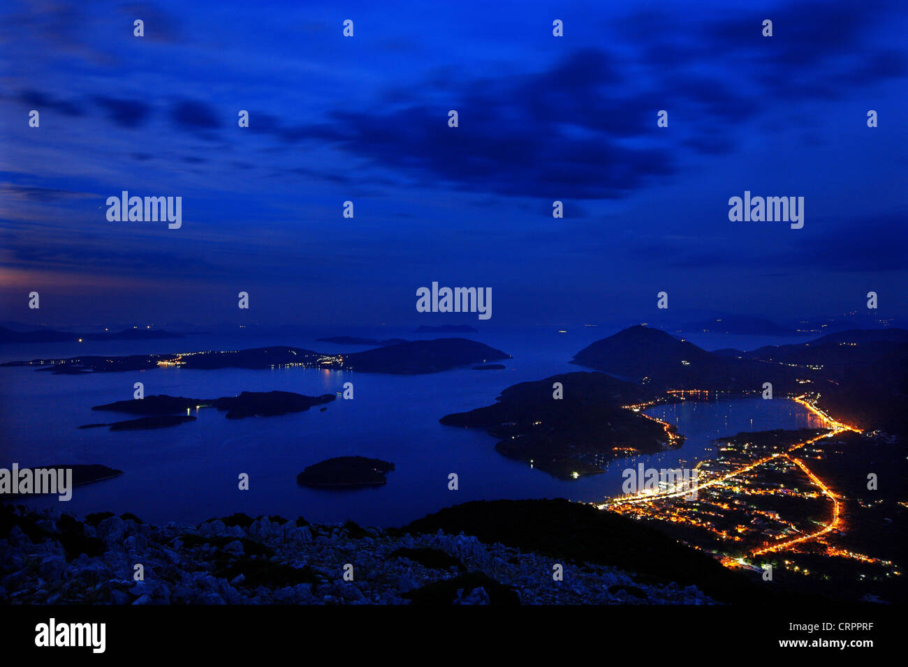 Panoramic night view of Vlychos bay and Nydri town from Skaroi mountain ...