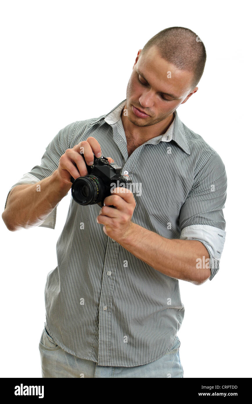 Man taking pictures with retro camera. Isolated on white Stock Photo ...