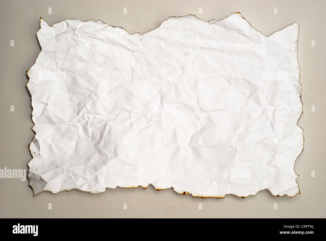 wrinkled burnt paper background Stock Photo - Alamy