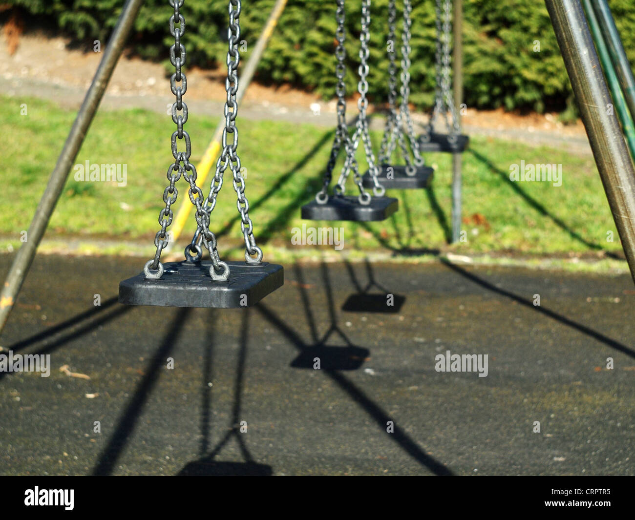 Children`s swing in playground Stock Photo - Alamy