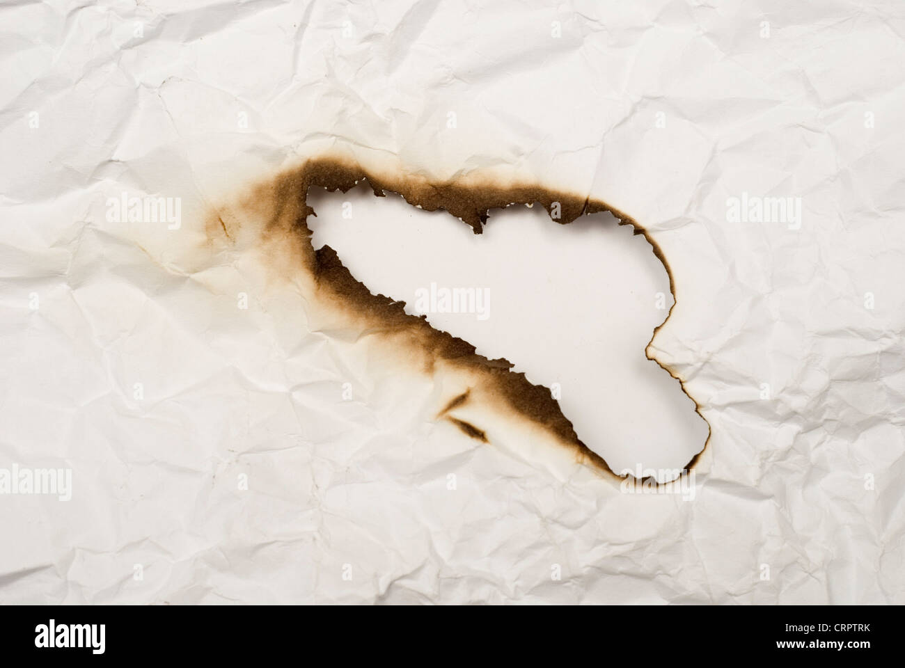 Hole in a paper hi-res stock photography and images - Alamy