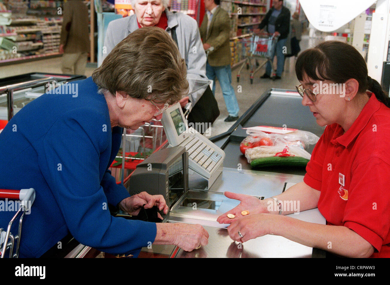 German Supermarket Cashier Stock Photos & German Supermarket Cashier ...