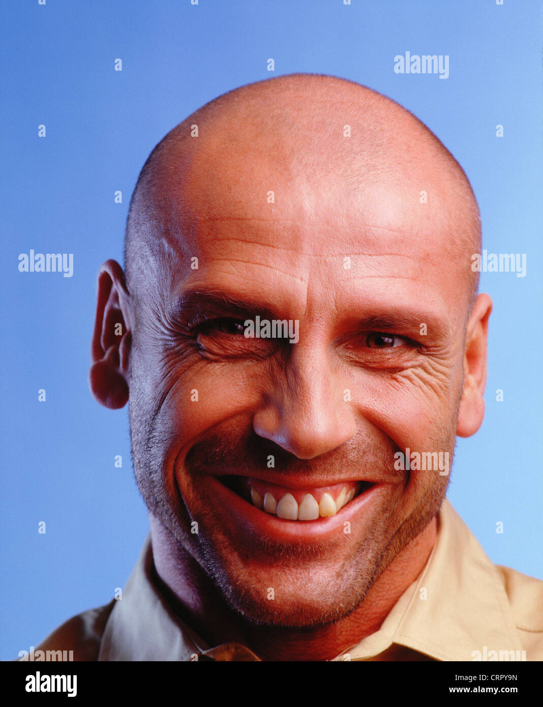 Bald man with smiles Stock Photo - Alamy