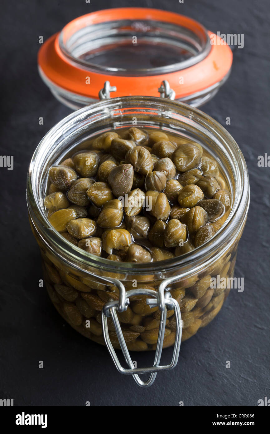 Capers in Glass Storage Jar Stock Photo - Alamy