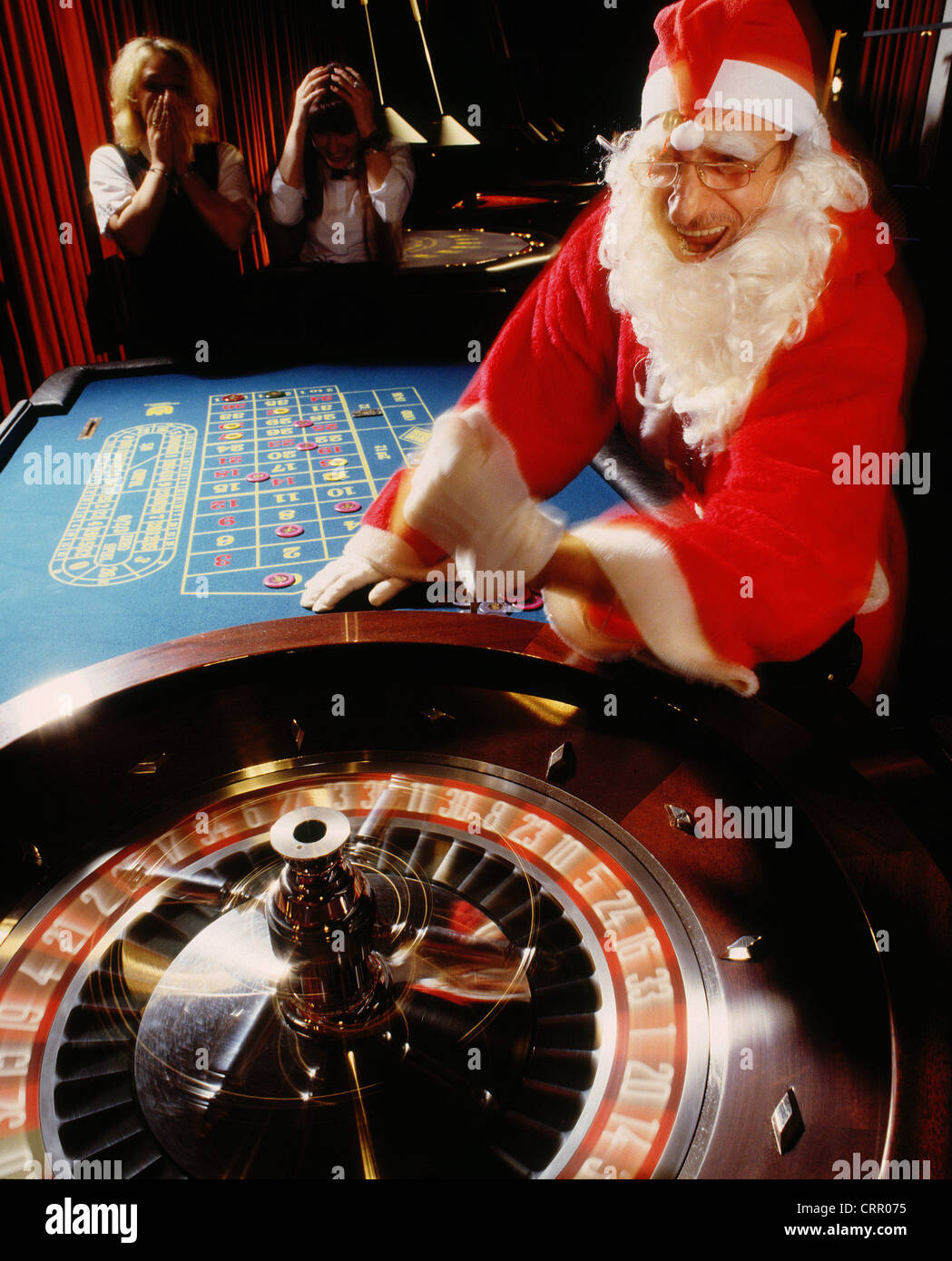Santa Claus playing roulette Stock Photo - Alamy