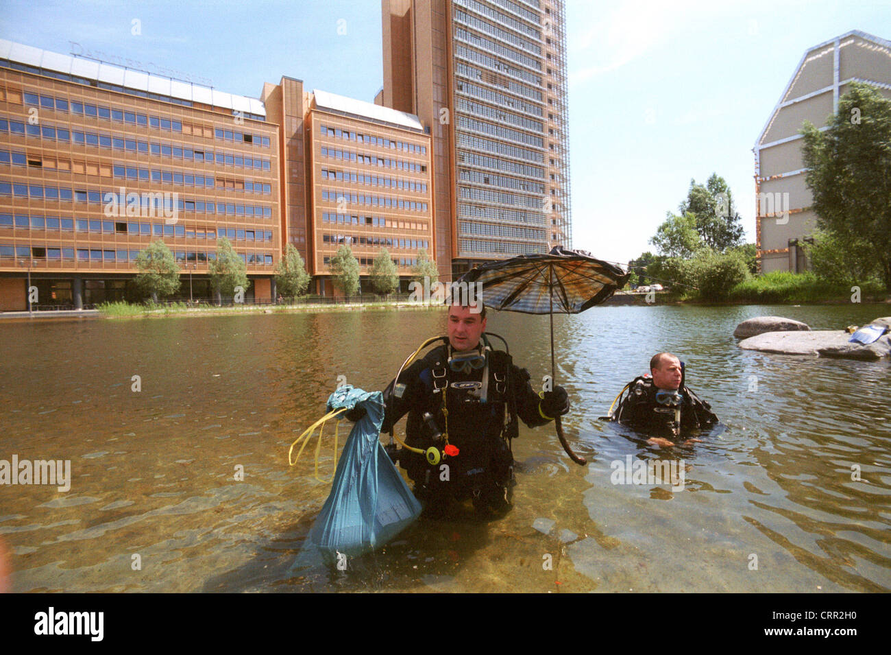 Divers clean lake at Potsdamer Platz, Berlin Stock Photo - Alamy