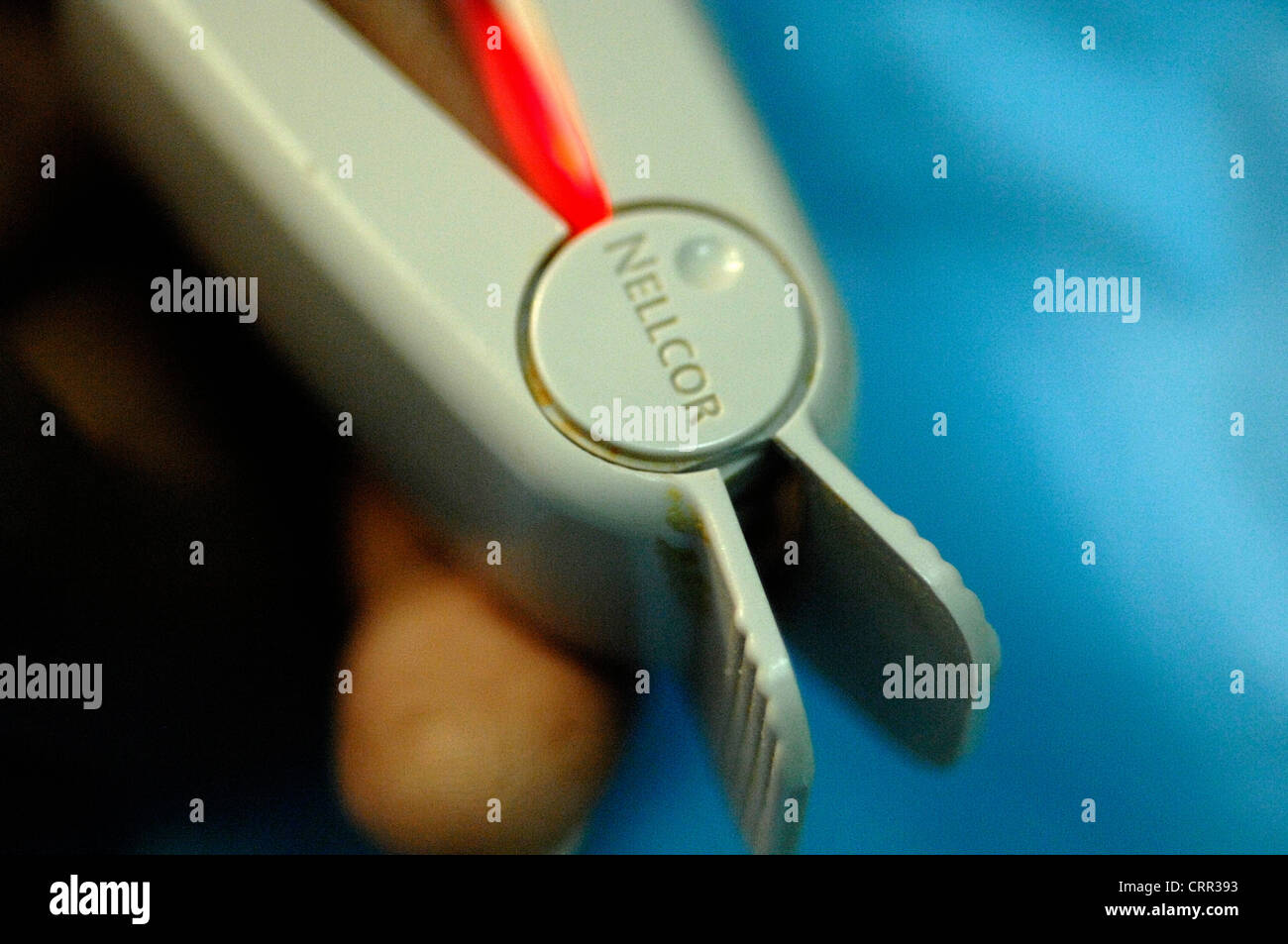 Finger pulse monitor Stock Photo - Alamy