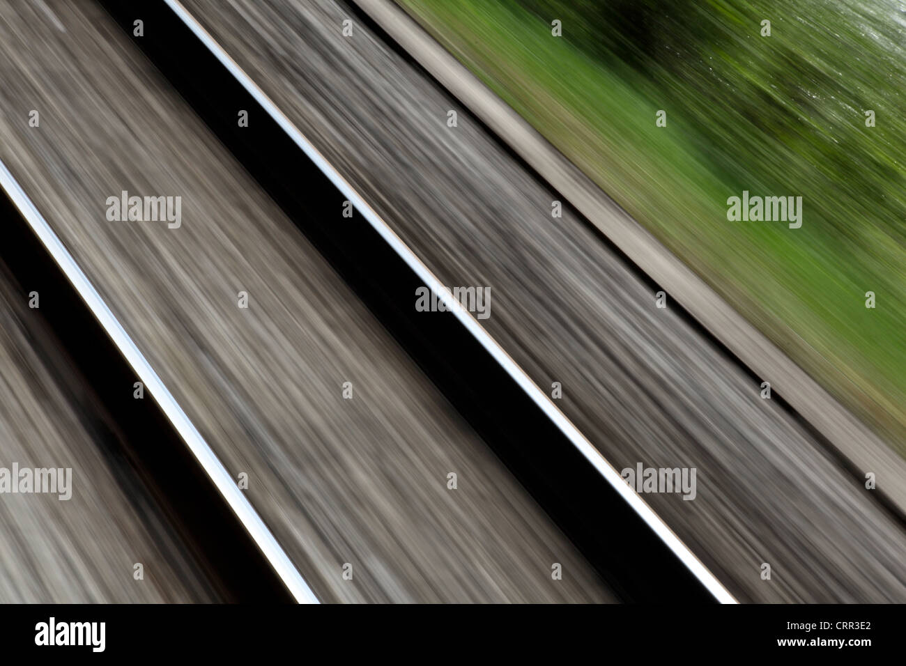 Railroad seen from a fast moving train. (motion blurred Stock Photo - Alamy