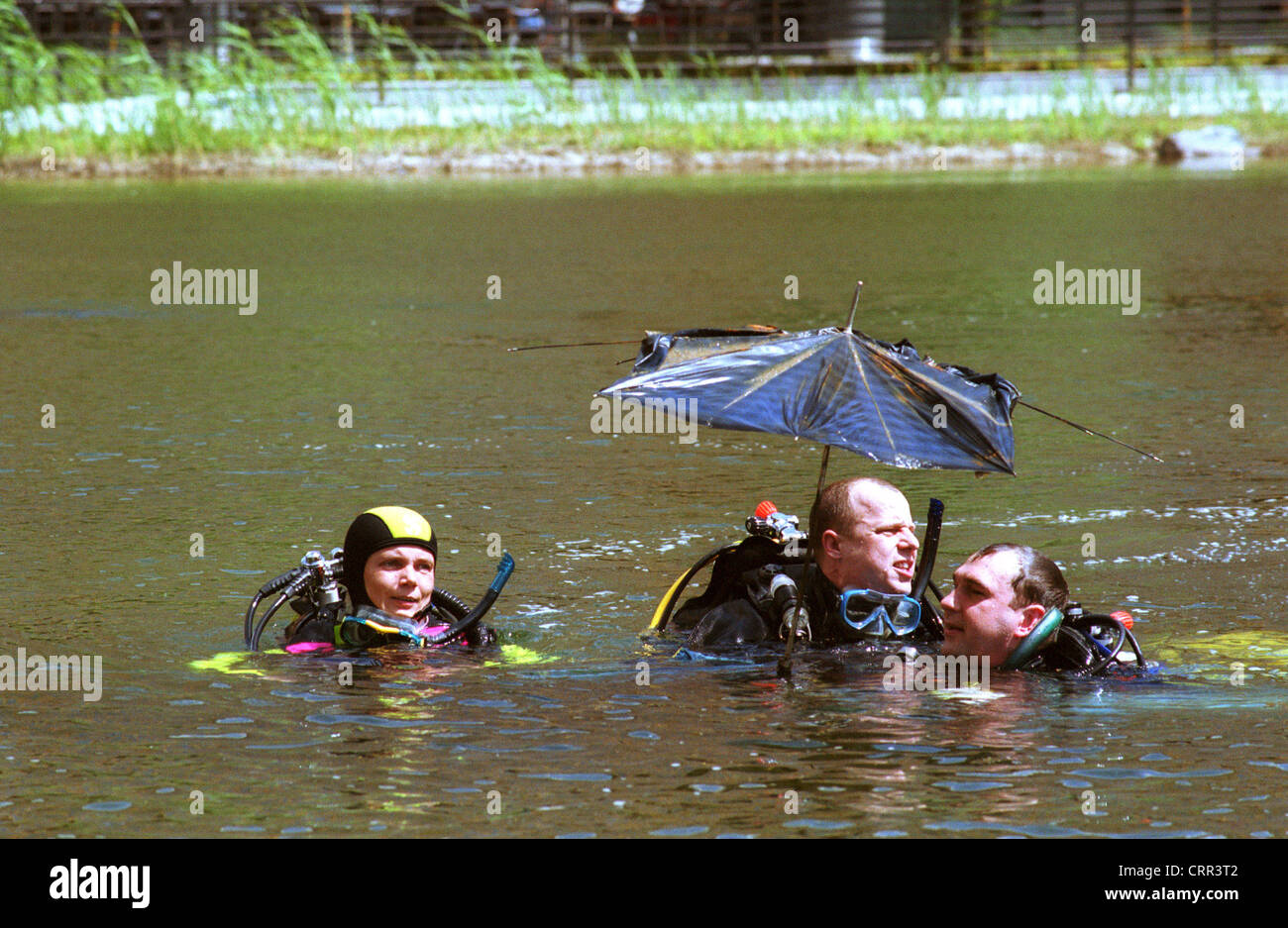 Divers clean a lake Stock Photo - Alamy