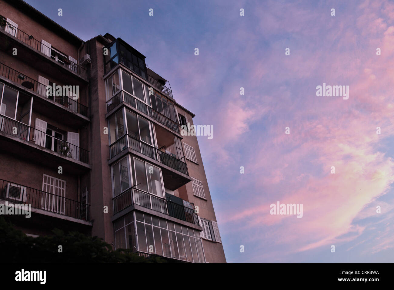 Residential concept - apartment building at dusk (color toned image ...