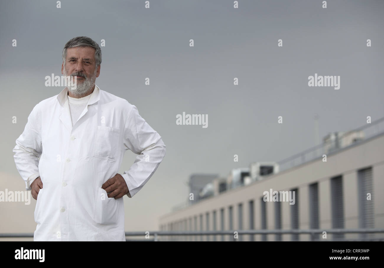 Doctor standing on roof hi-res stock photography and images - Alamy