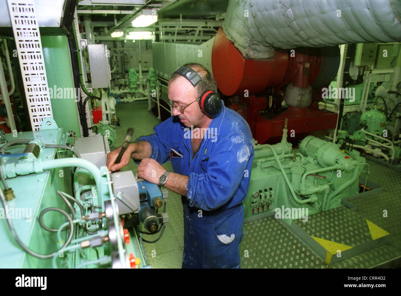 Engineer of a ship at work Stock Photo - Alamy