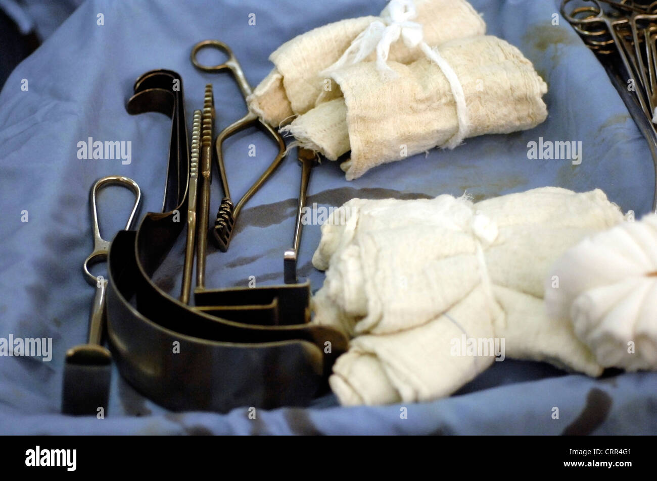 A range of sterile surgical instruments including; swabs and retractors ...