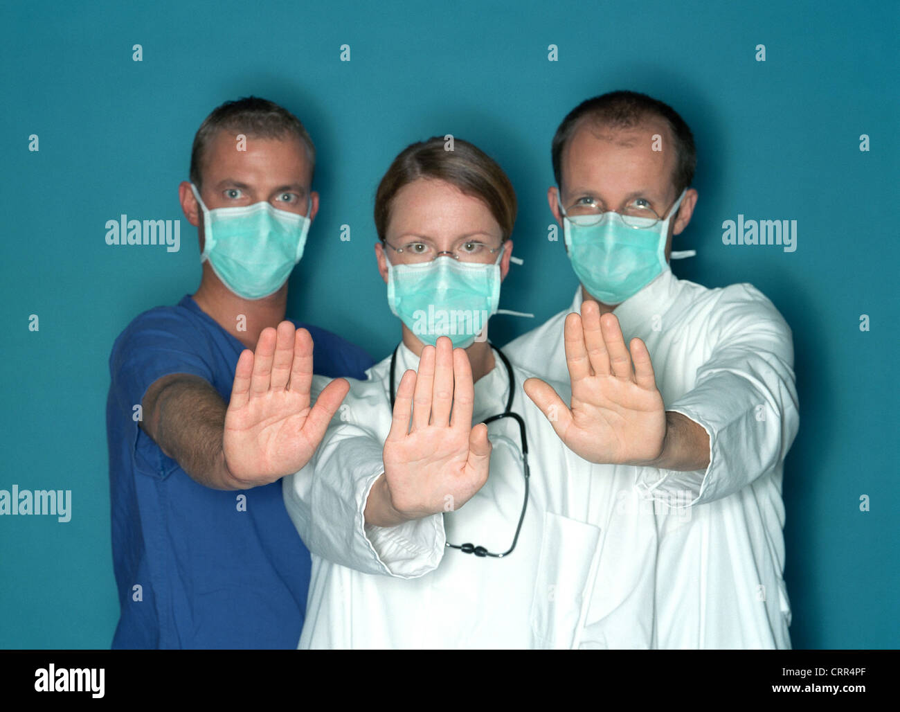 Group of two physicians and nurses with surgical masks Stock Photo - Alamy