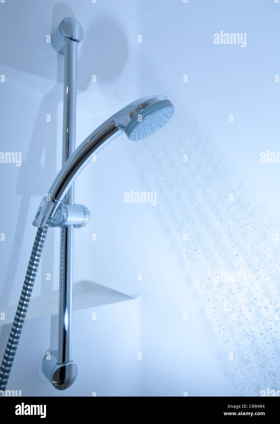 Shower with running water (color toned image Stock Photo - Alamy