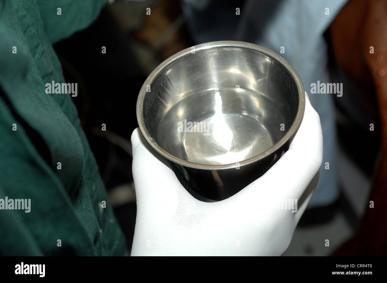 Surgical pot contatining alcohol; used to clean the areas exposed ...