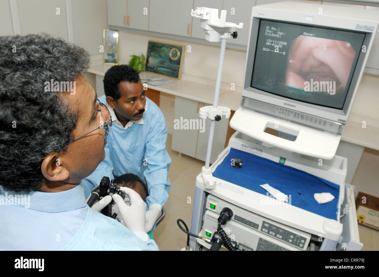 Doctors looking at biopsy screen Stock Photo - Alamy