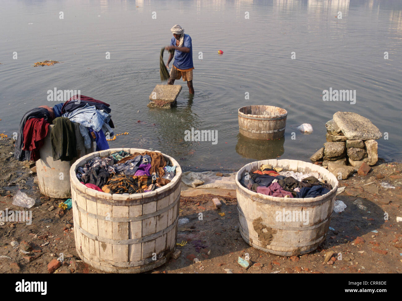 Man washing clothes in the Sabarmati river ( India Stock Photo - Alamy