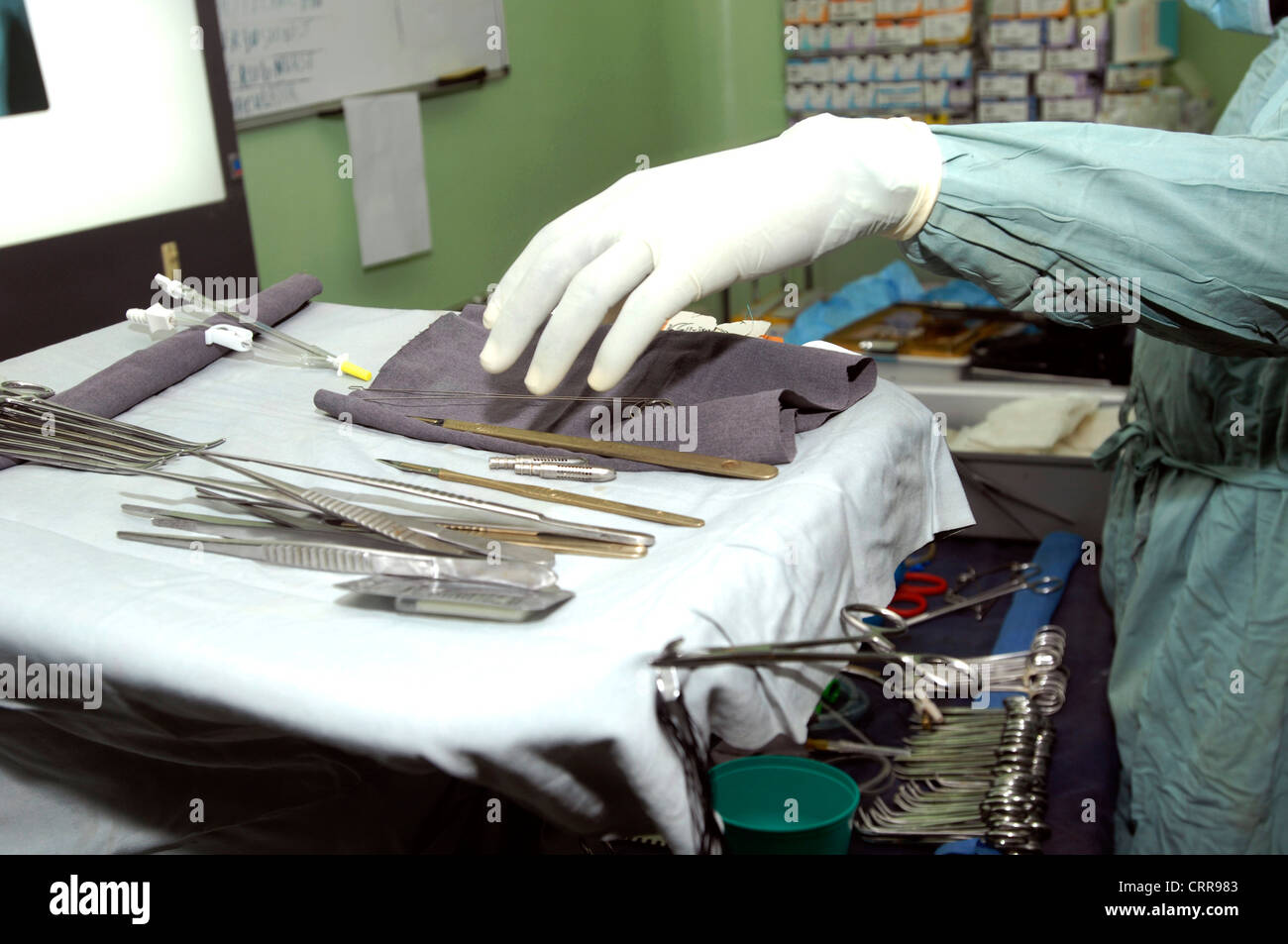 Scrub nurse preparing surgical instruments Stock Photo - Alamy