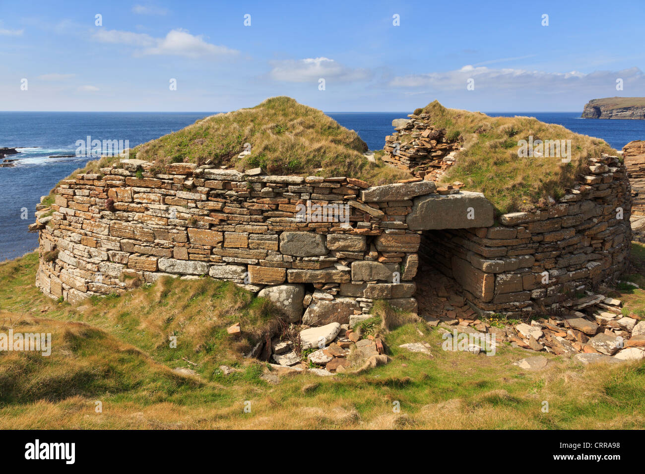 Ruined remains of ancient Broch of Borwick fortified stone round tower ...