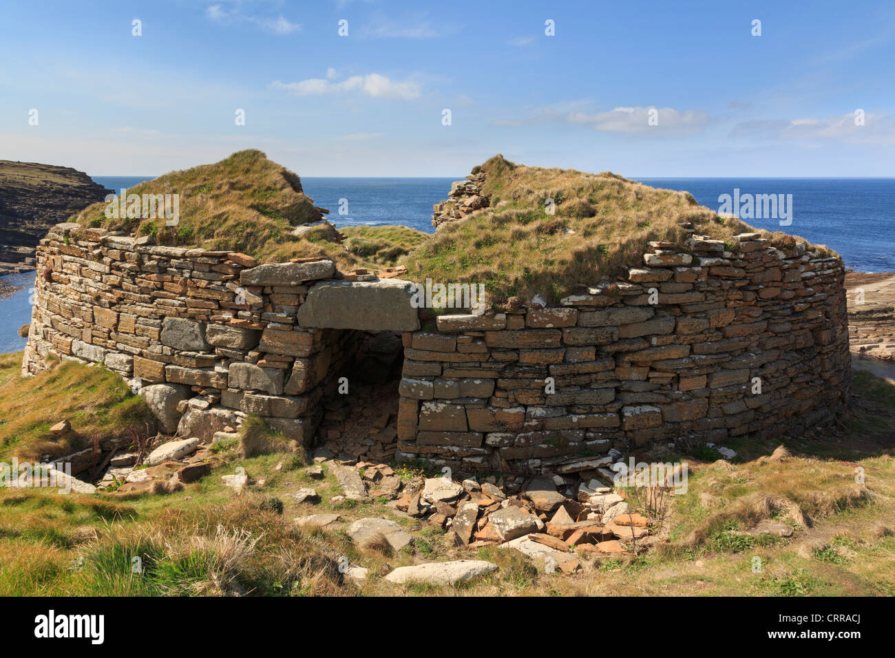 Ruined remains of ancient Broch of Borwick fortified stone round tower ...