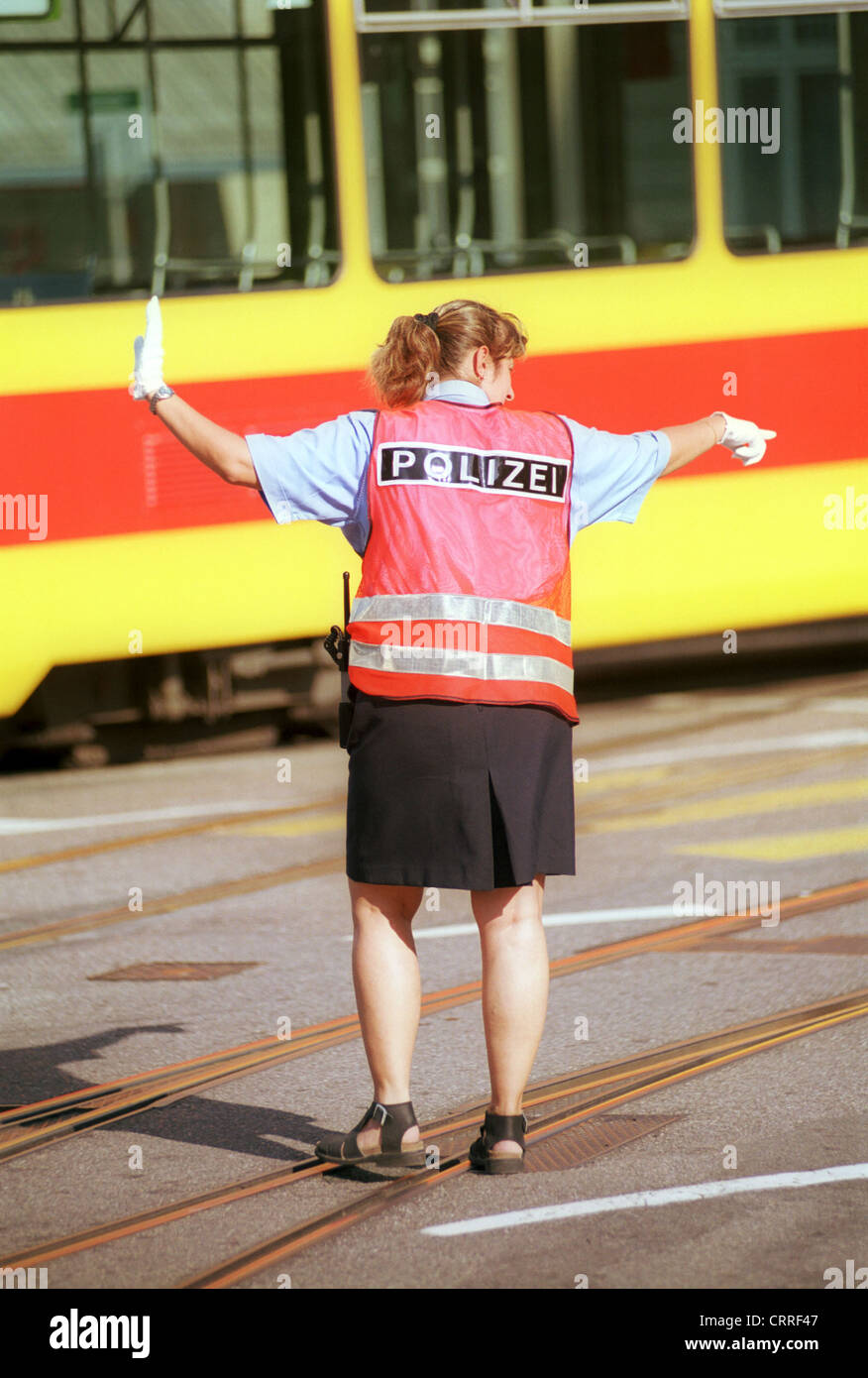 Traffic cop directing traffic in Basel Stock Photo - Alamy
