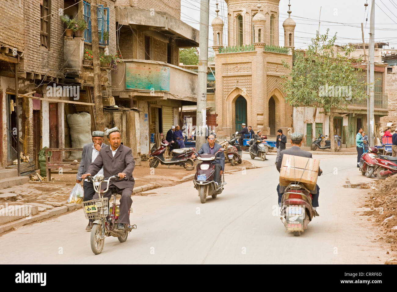A street view of Uyghur Chinese people in the Old City of Kashgar Stock ...