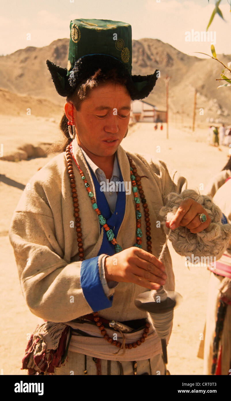 India, Ladakh, Leh, Ladakh Festival, man spinning wool Stock Photo - Alamy