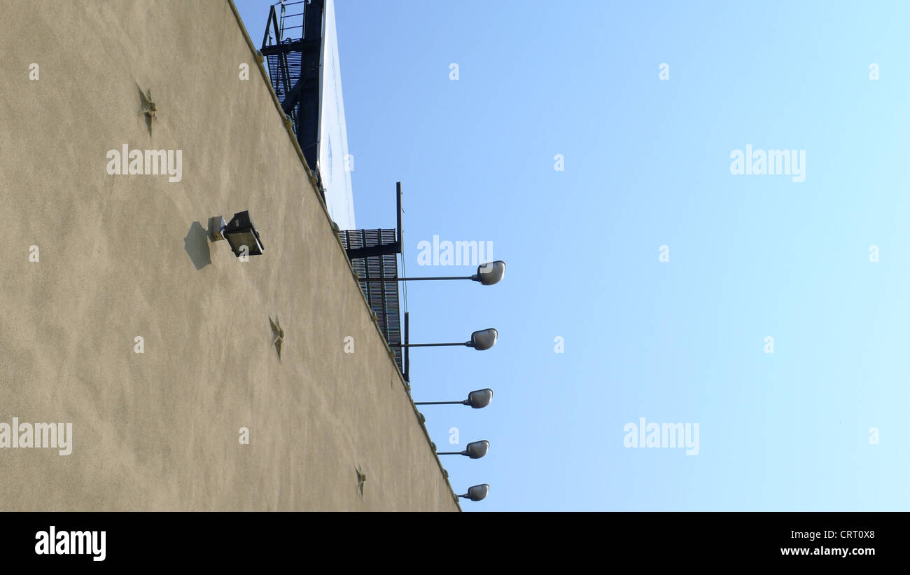 Low angle of warehouse wall with billboard Stock Photo - Alamy