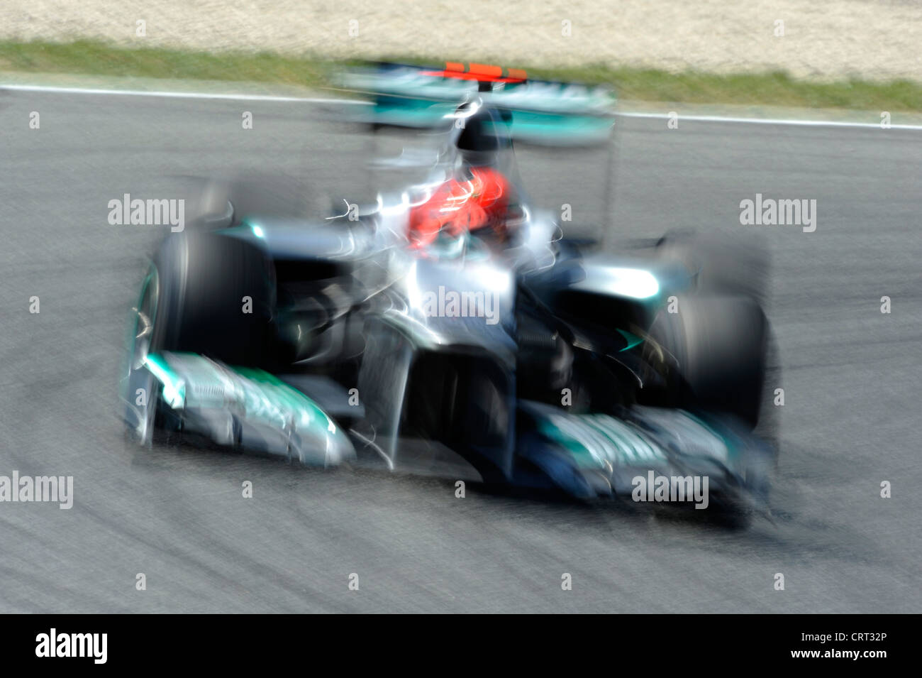 blurred Formula One race car during free practice for the Spanish ...