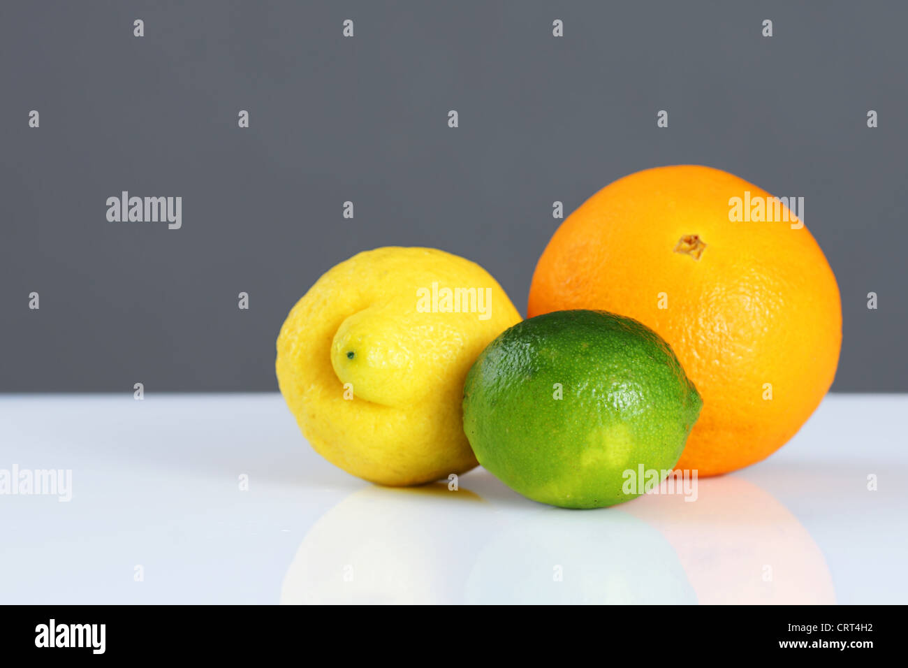 Beautiful studio still life of whole citrus fruits, orange, lemon and ...