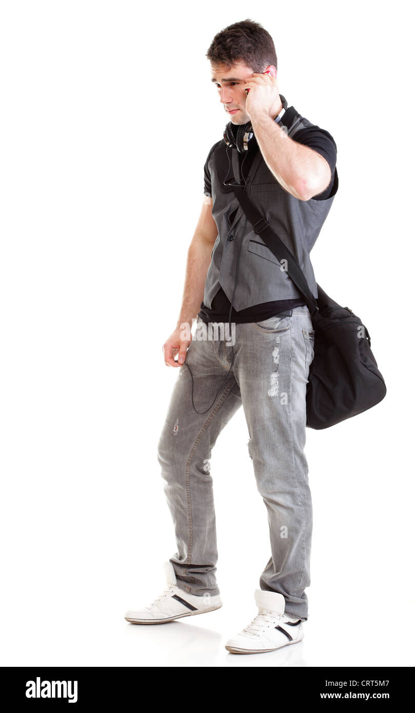 Full length portrait school boy with phone isolated on white. Music or ...