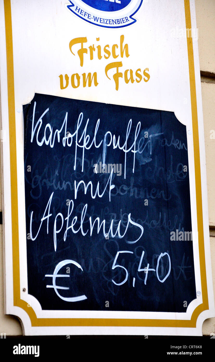 Berlin, Germany. Menu board outside restaurant. Potato pancakes ...