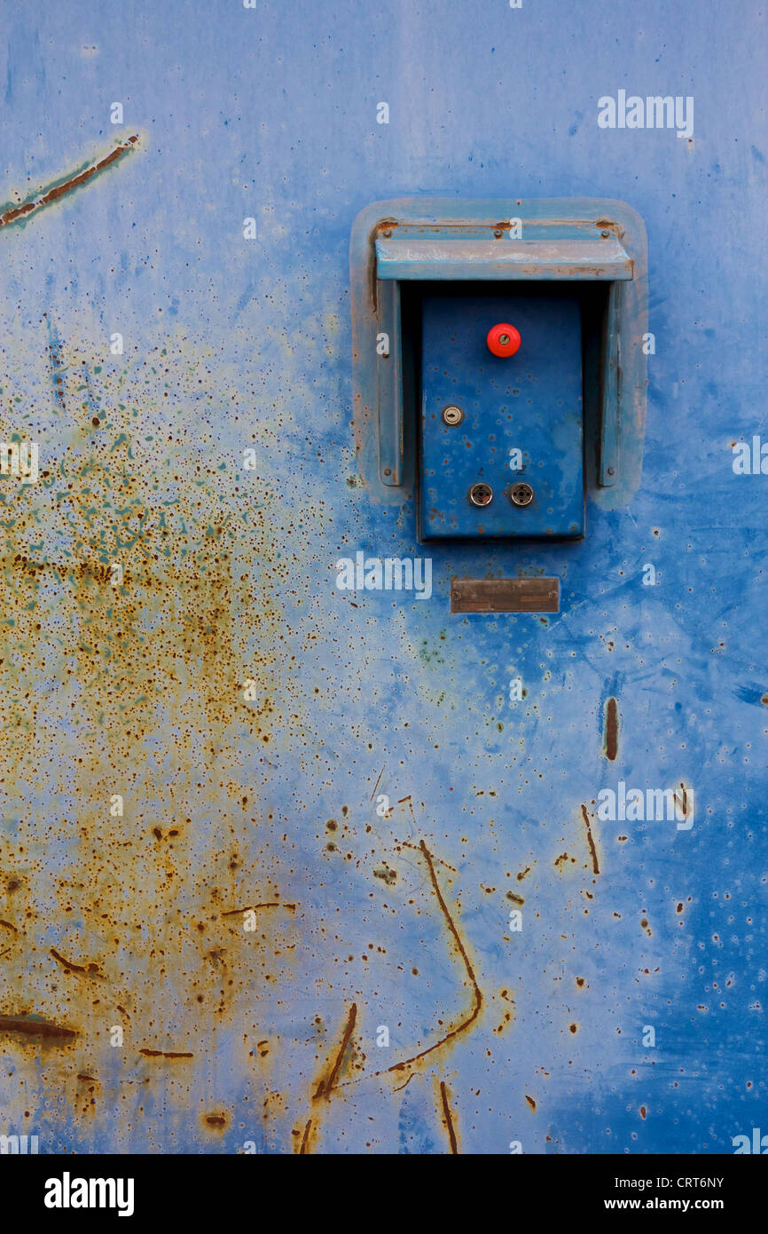 Detail of the controls on a weathered blue industrial hangar gate Stock ...