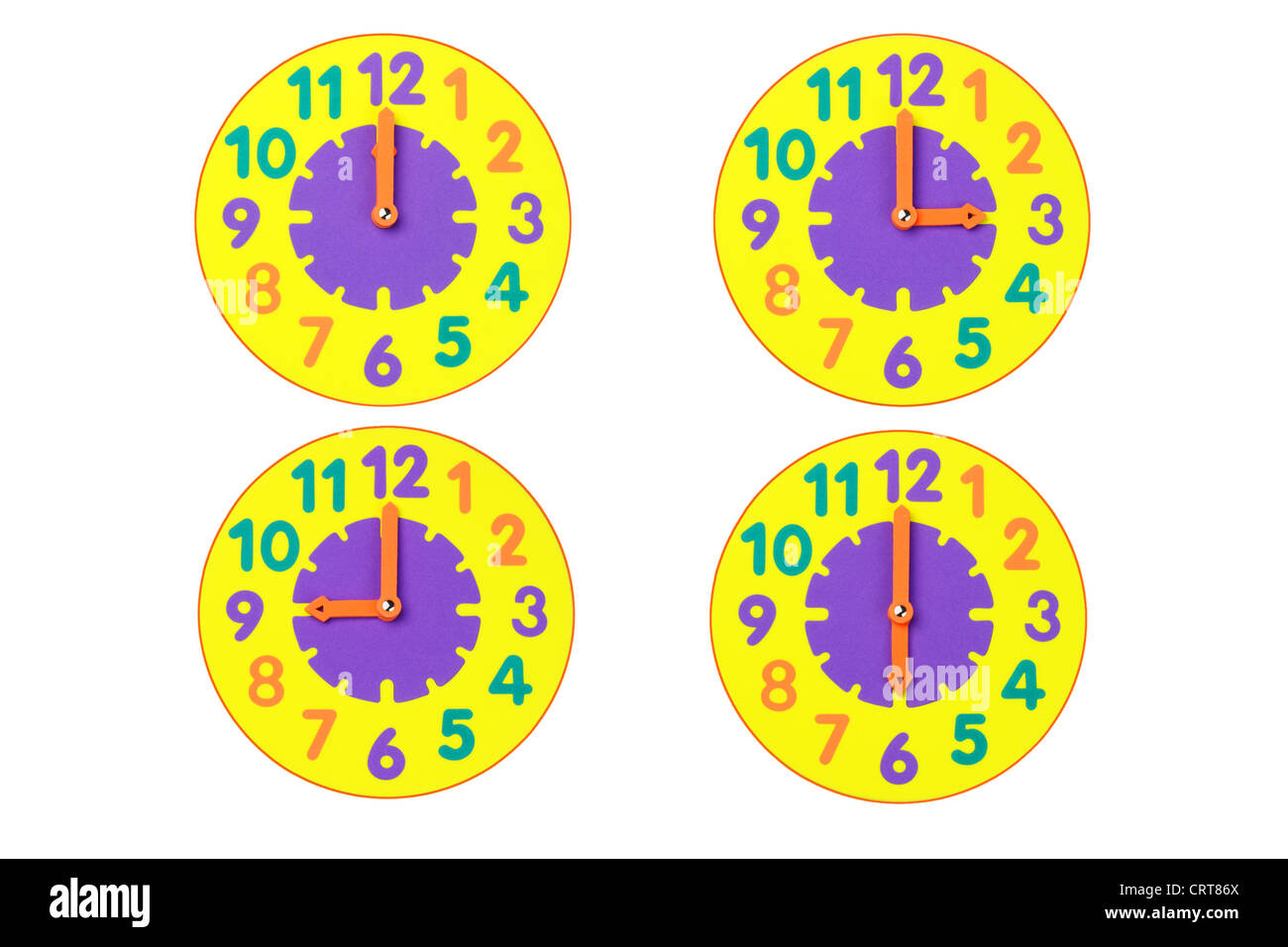 Colorful Toy Clocks on White Background Stock Photo - Alamy