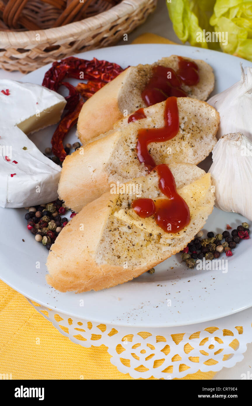 bruschetta with cheese camembert and color pepper spice Stock Photo - Alamy