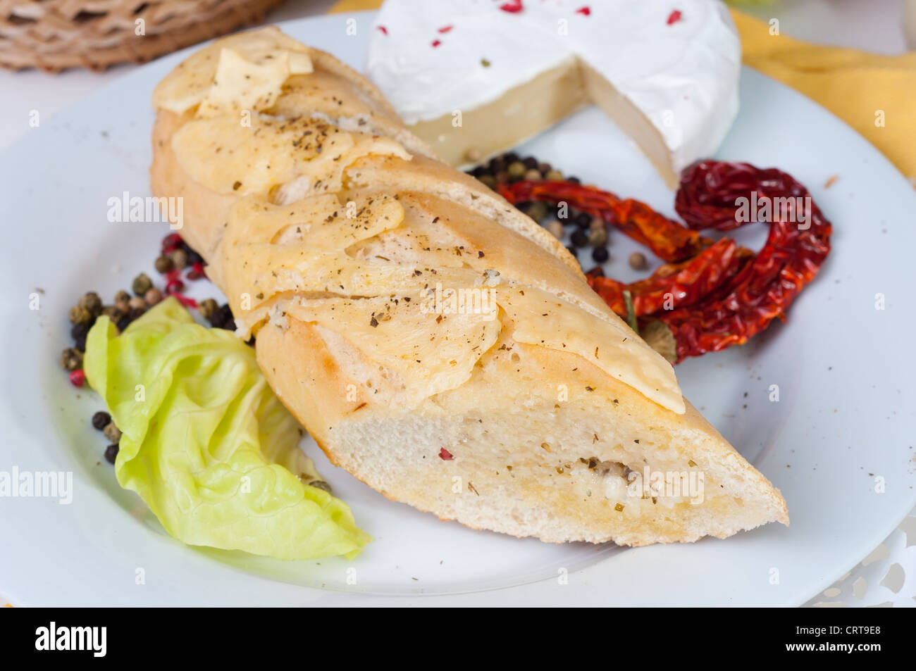 bruschetta with cheese camembert and color pepper spice Stock Photo - Alamy