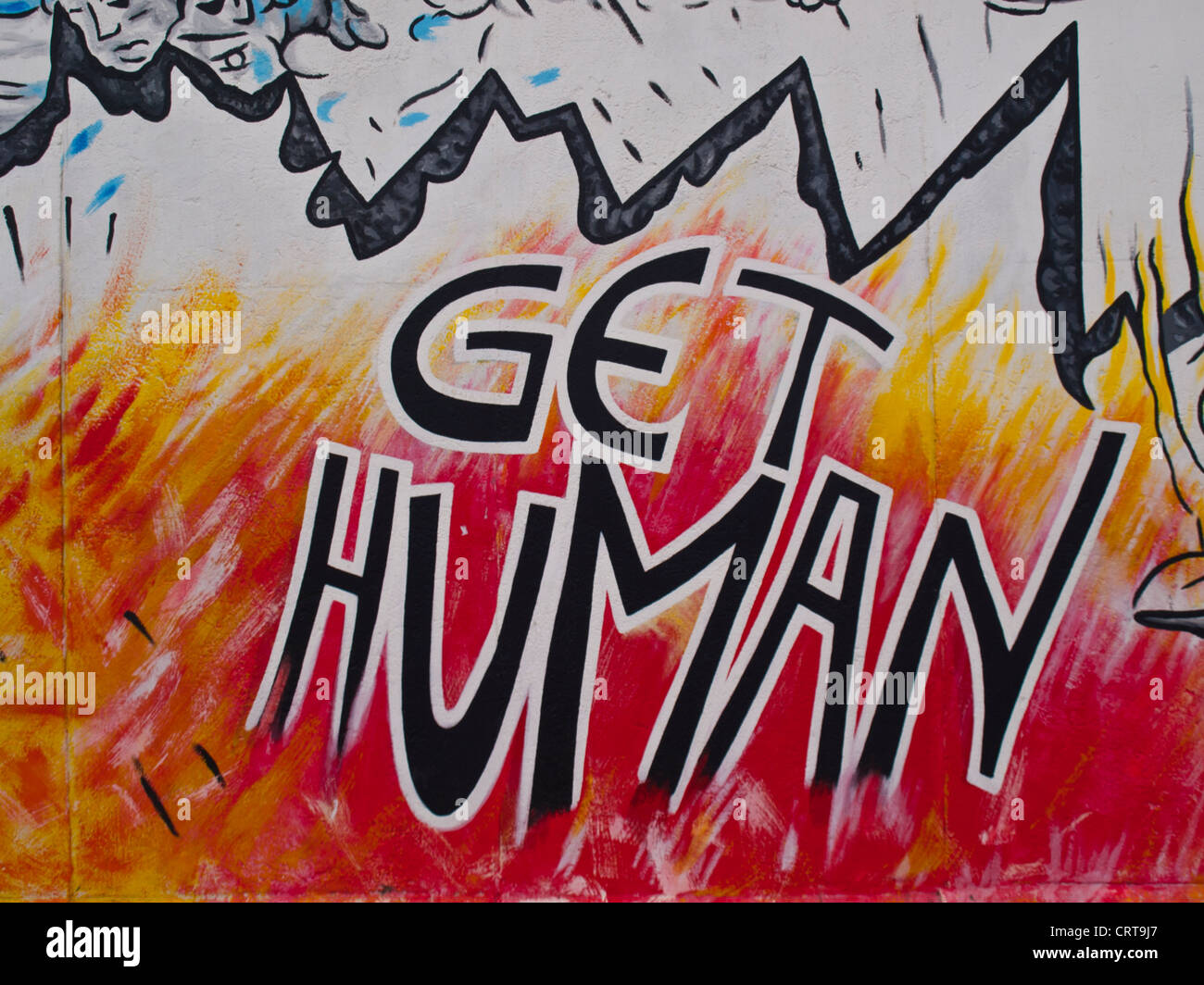 Berlin wall paintings and graffiti "Get Human Stock Photo - Alamy