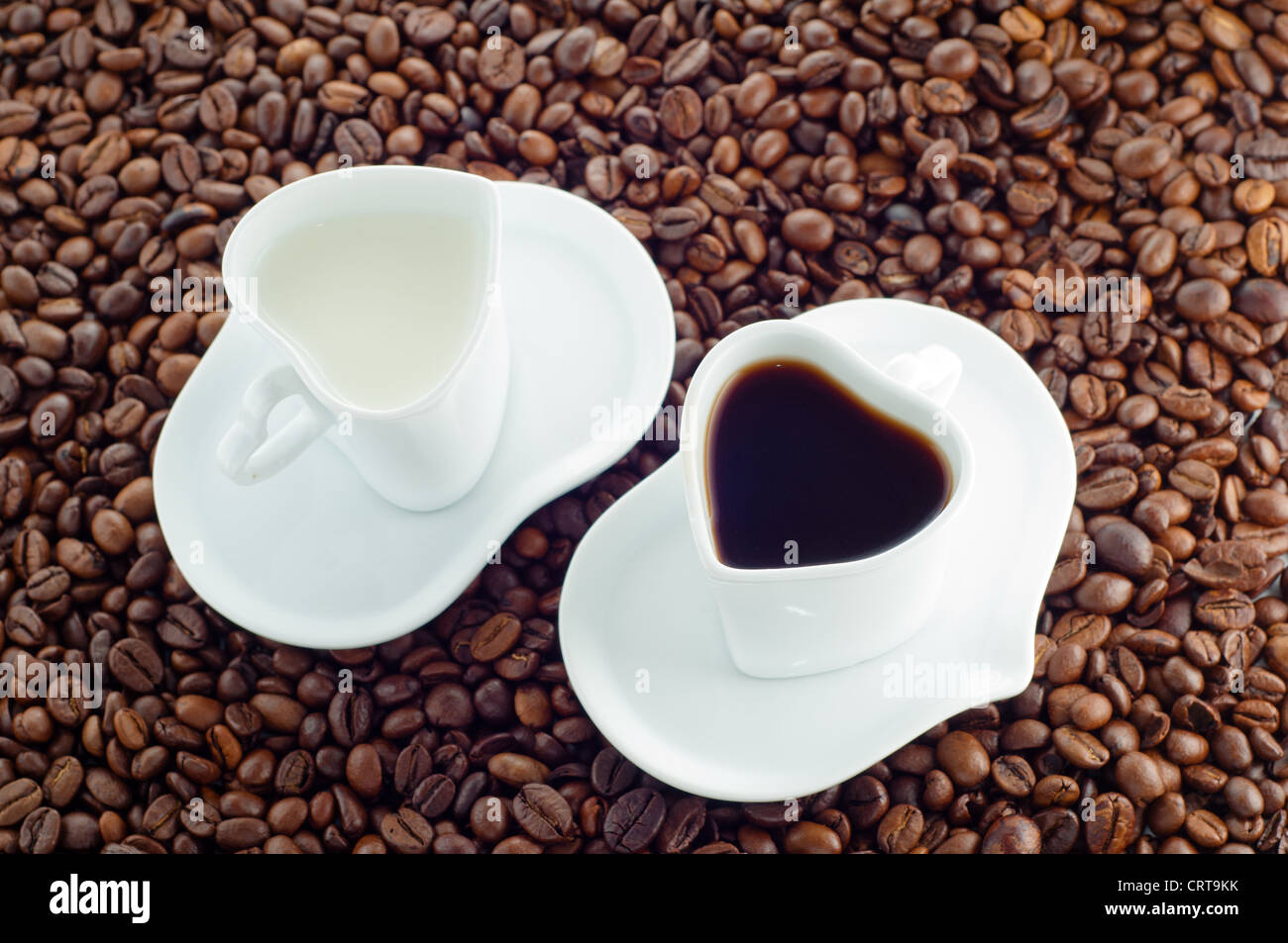 Cup of milk and coffee cup Stock Photo - Alamy