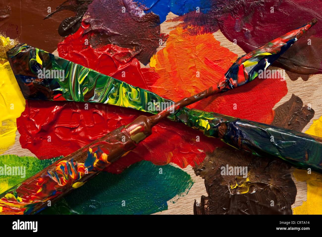 Artist palette with paint knife for mixing paints Stock Photo - Alamy