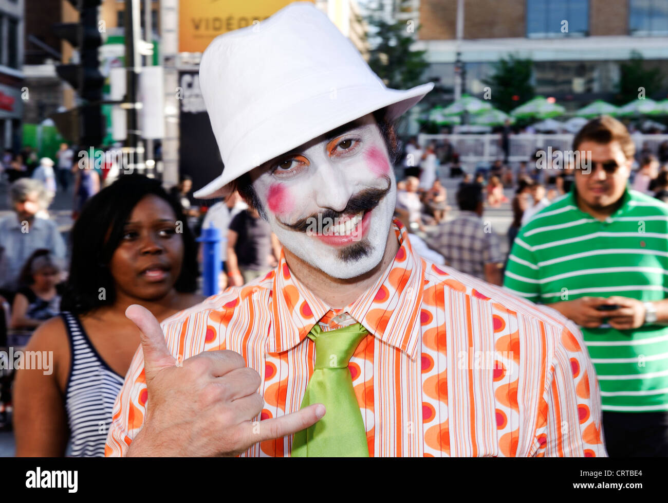 Colorful male character making a call me gesture during the Just for ...