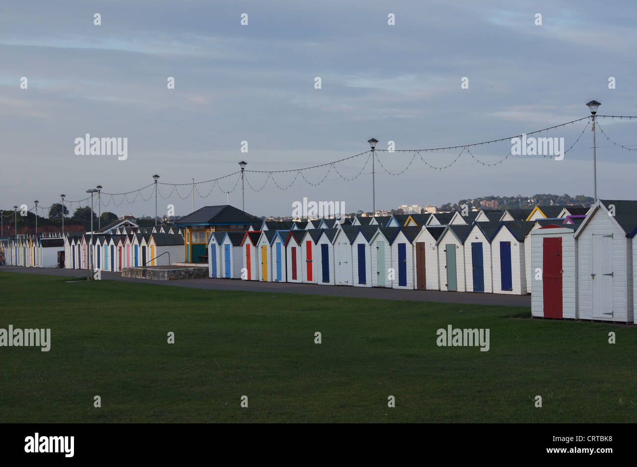Beach huts along the promenade at Paignton, Devon, UK Stock Photo - Alamy