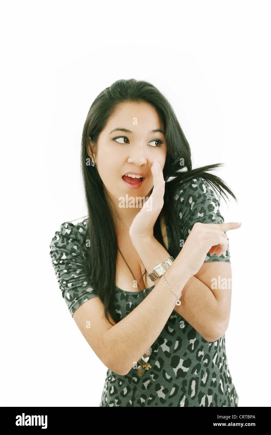beautiful woman laughing and pointing at someone Stock Photo - Alamy