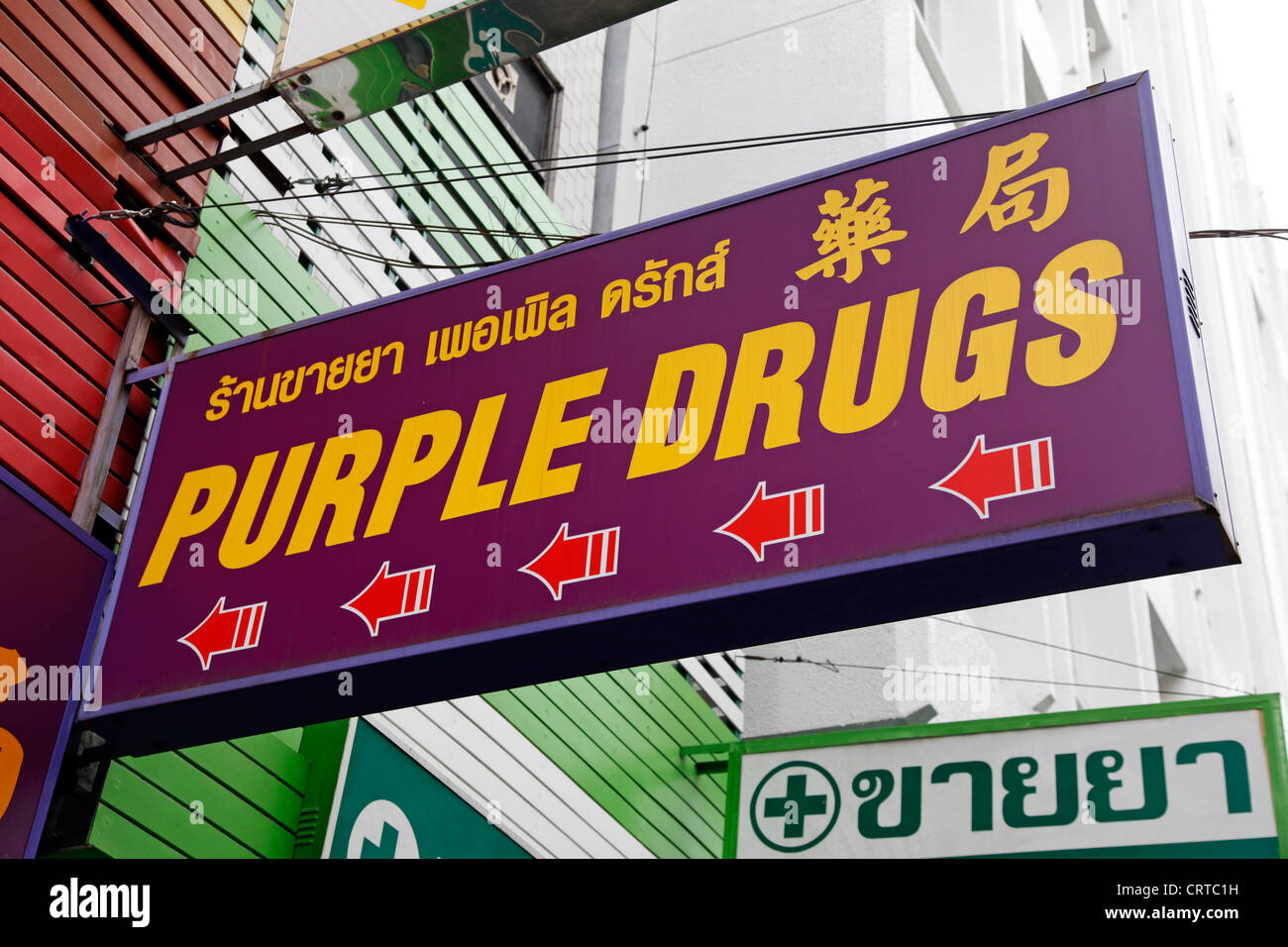 Purple Drugs sign outside a pharmacy in Bangkok, Thailand Stock Photo ...