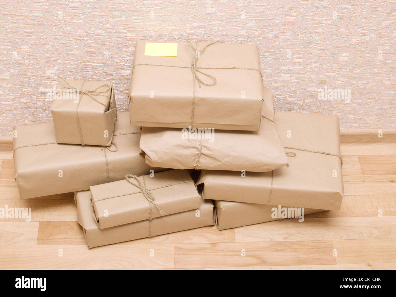 shipping boxes on a floor Stock Photo - Alamy
